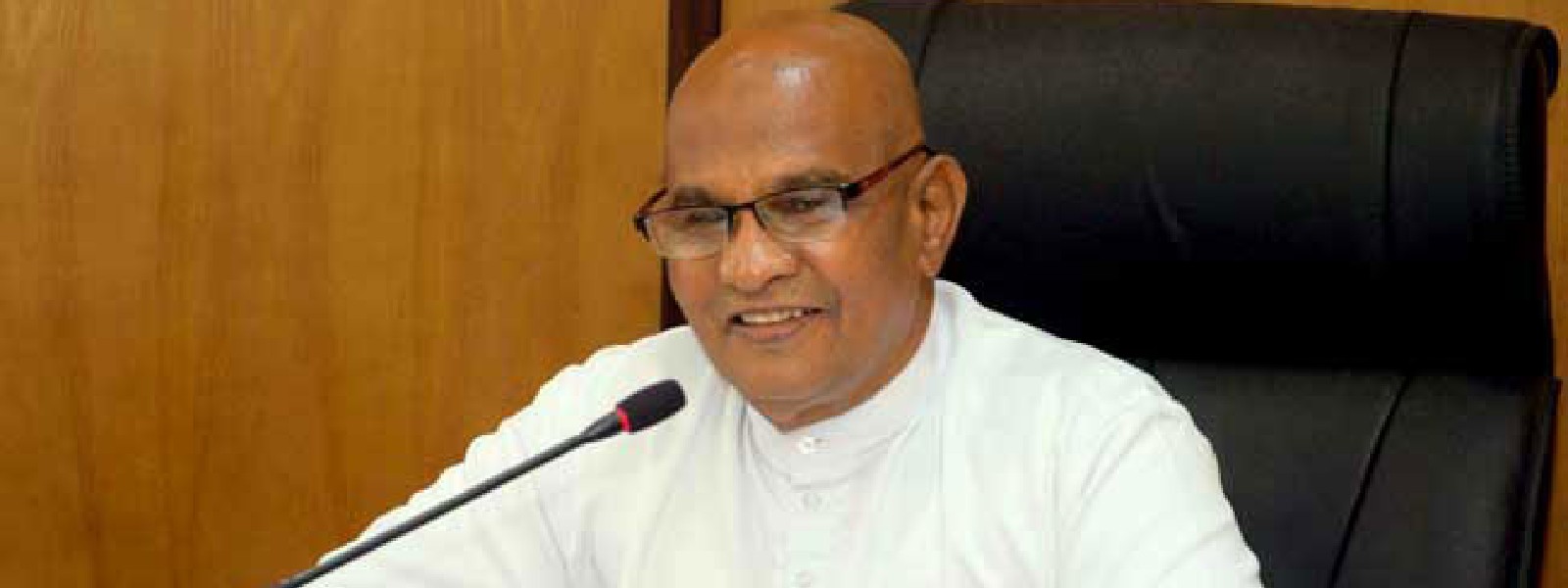 Former Minister Reginald Cooray has died at 74